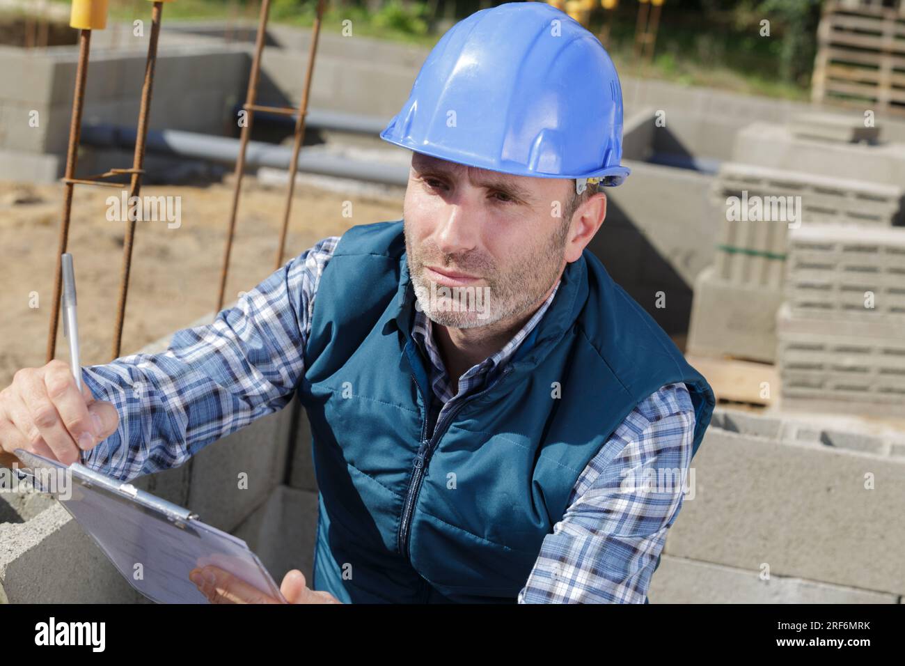 Serious architect engineer writing hi-res stock photography and images ...