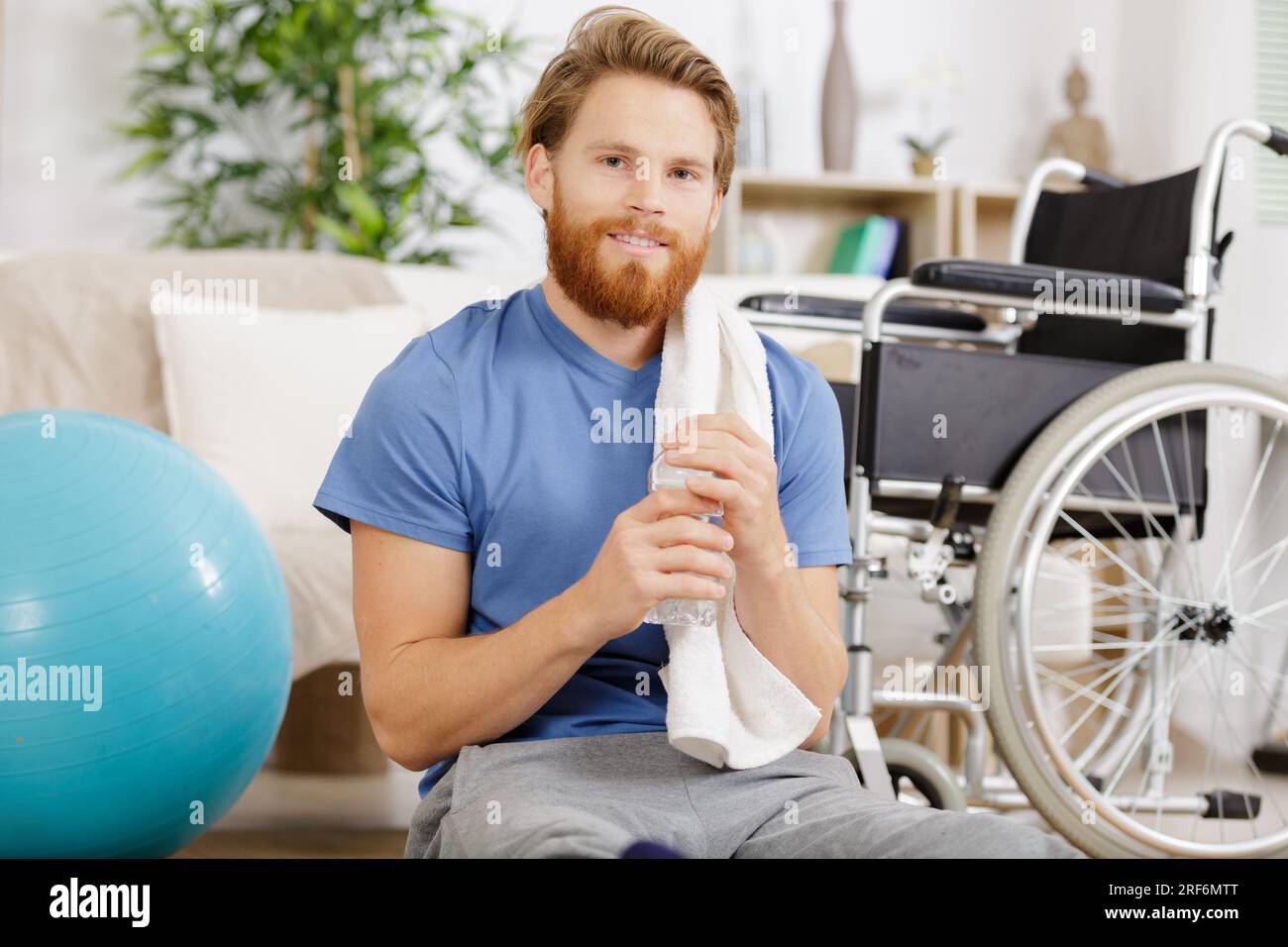 handicapped man in wheelchair after working out Stock Photo - Alamy