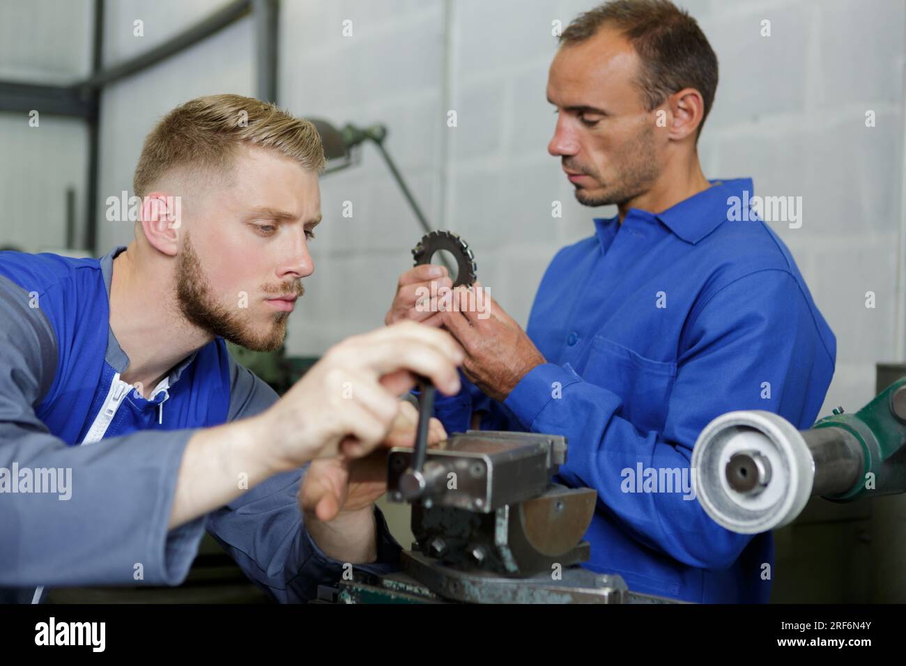 Professional repairman inspecting car engine hi-res stock photography and images - Alamy