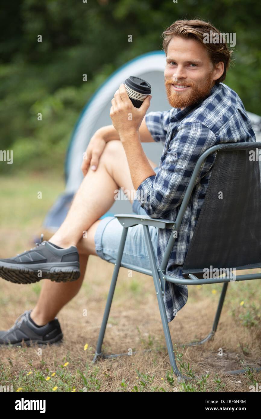 man drinking warm tea or coffee in the morning outdoor Stock Photo - Alamy