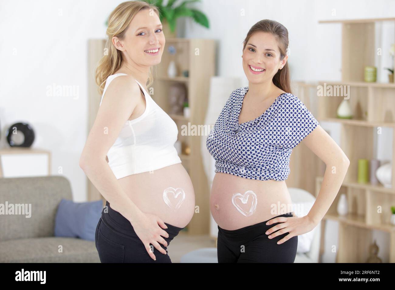 Pregnant friends showing hi-res stock photography and images - Alamy