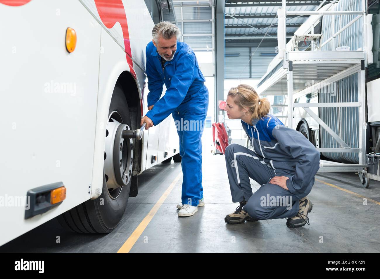 Teaching young mechanics hi-res stock photography and images - Alamy