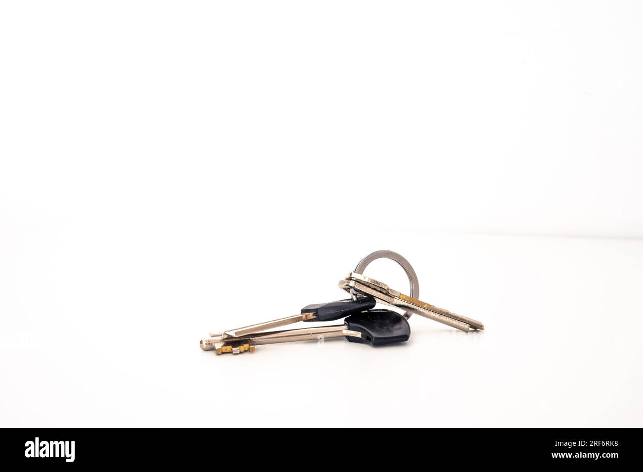 Bunch of tree metal and plastic keys Stock Photo - Alamy