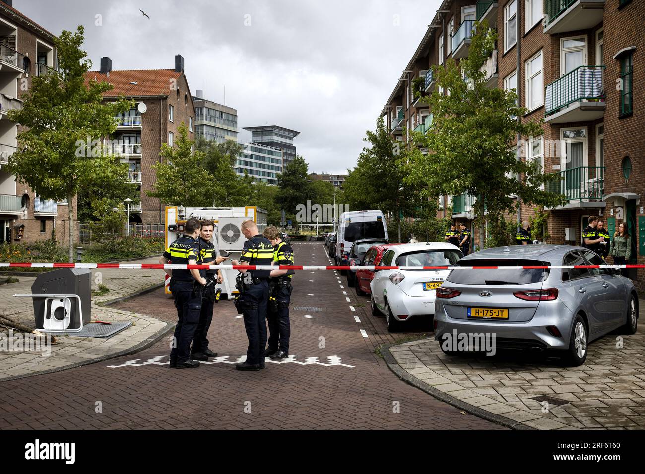 AMSTERDAM - Emergency workers at a home in Robert Scottstraat where two ...