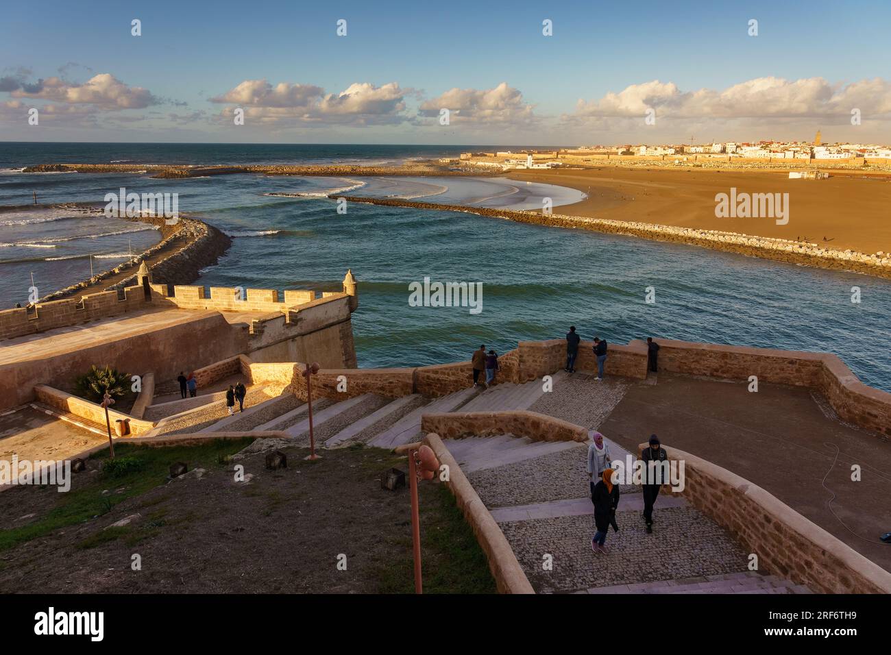 Morocco. Rabat. People are walking trought the wall of the Kasbah of ...