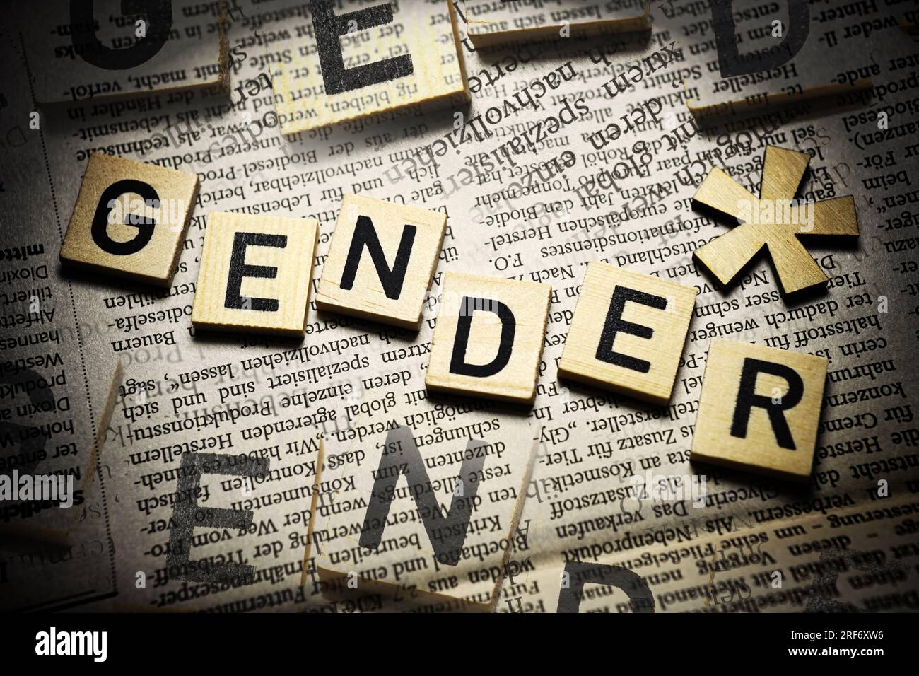 FOTOMONTAGE, Buchstaben formen das Wort Gender mit Gendersternchen auf ...