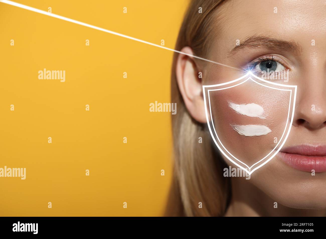 Sun protection care. Beautiful woman with sunscreen on face against ...