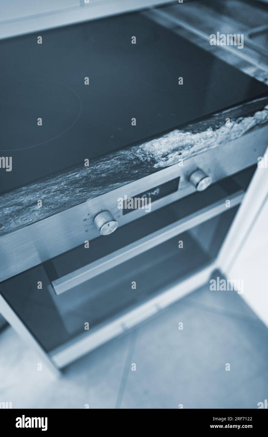Modern electric stove with induction cooktop Stock Photo - Alamy