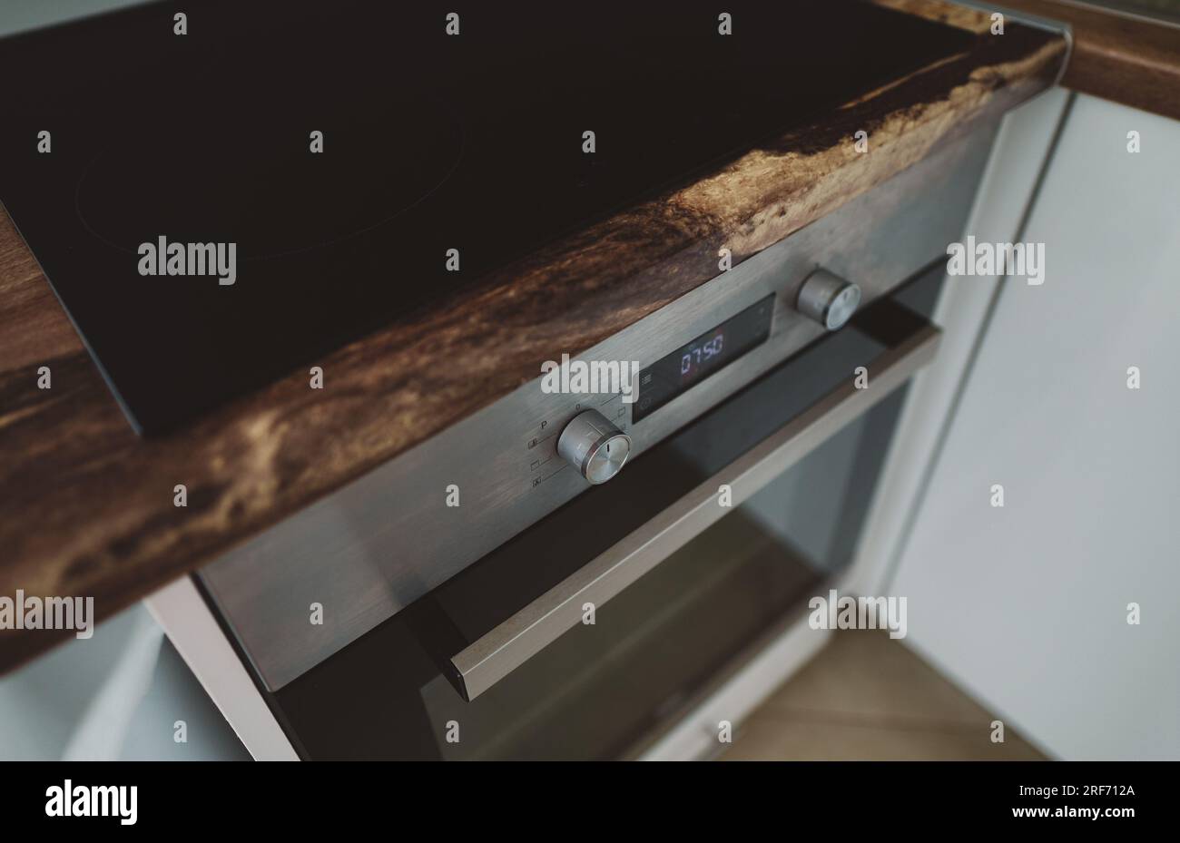 Modern electric stove with induction cooktop Stock Photo - Alamy