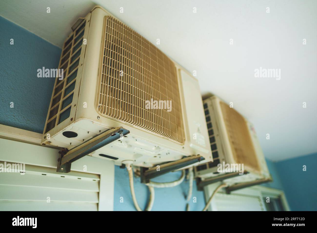 Two air conditioners on the wall Stock Photo - Alamy