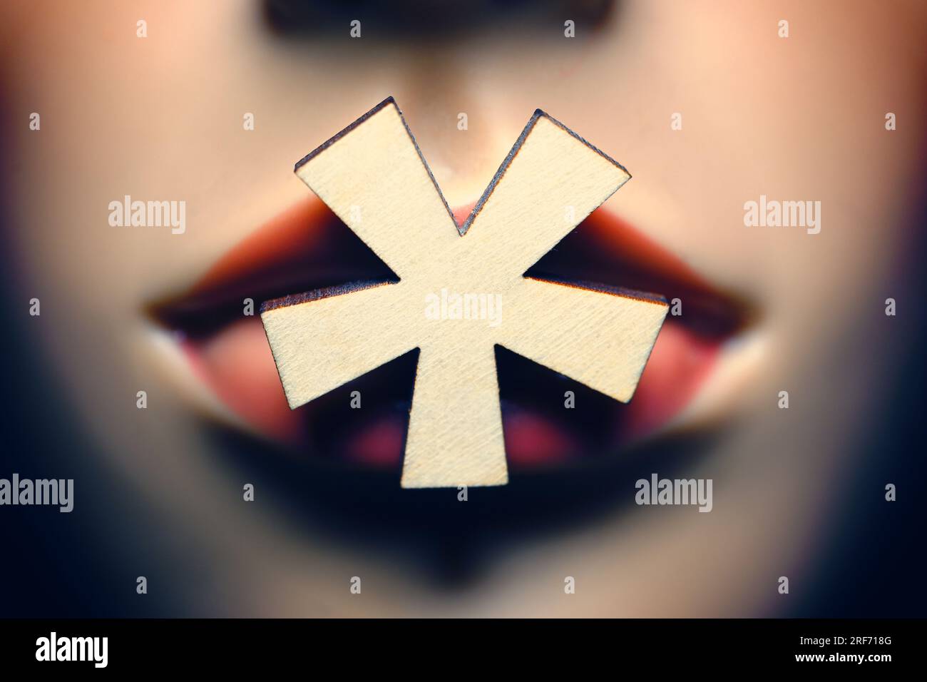 Gendersternchen auf dem Mund einer Frauenfigur, Symbolfoto ...