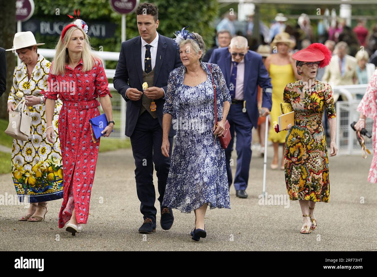 Racegoers arrive for day one of the Qatar Goodwood Festival at Goodwood ...