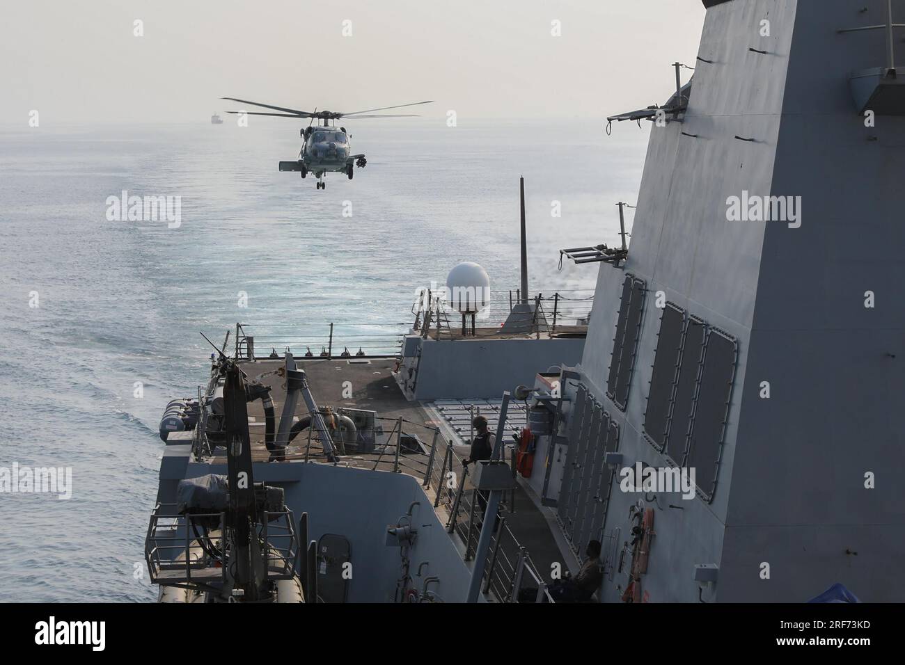 230728-N-AL206-1059 STRAIT OF HORMUZ (July 28, 2023) An MH-60R ...
