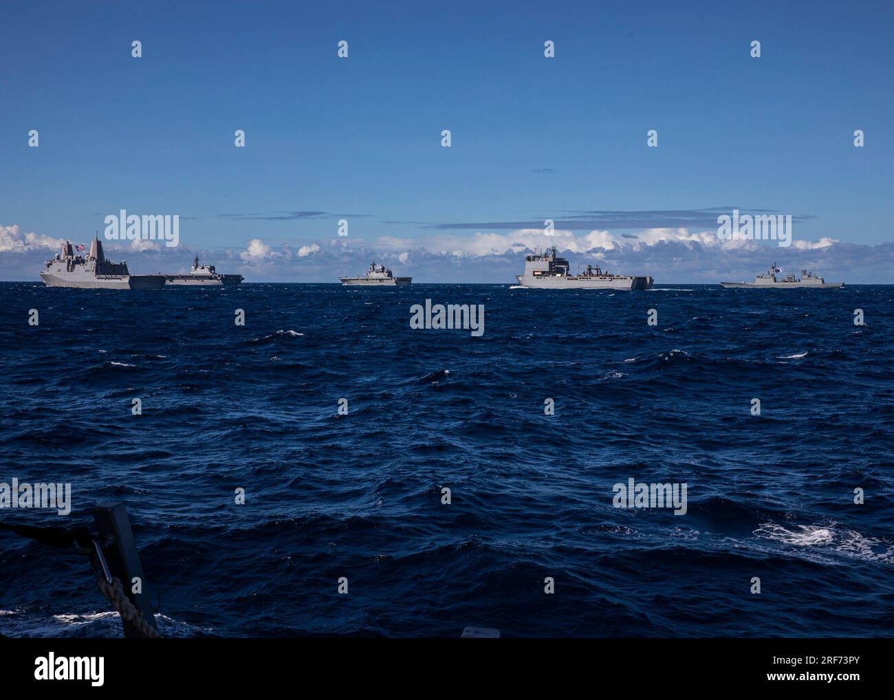 CORAL SEA (July 29, 2023) Various U.S. Navy and allied ships transit in ...