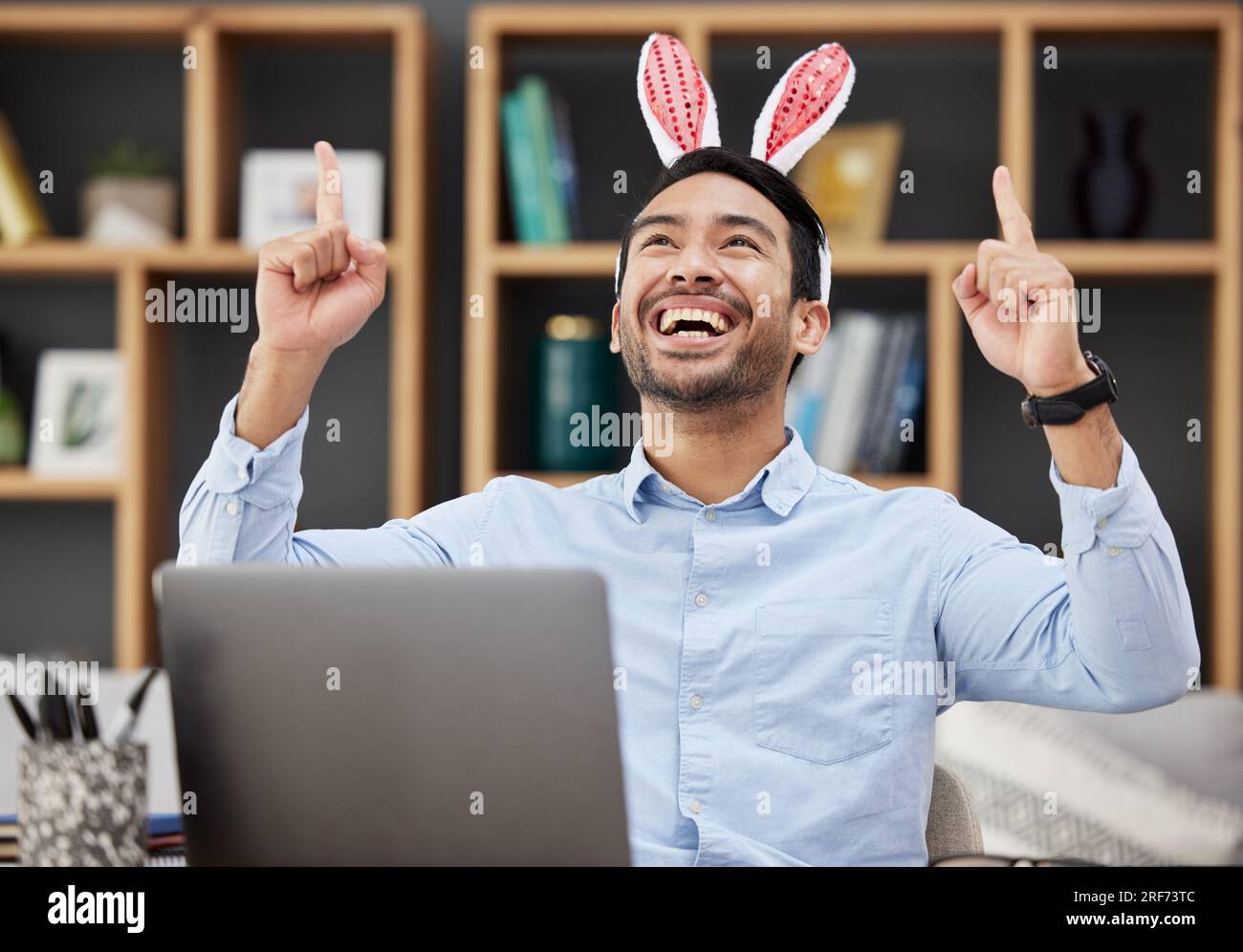 Bunny ears, easter and celebration by business man excited, happy and ...