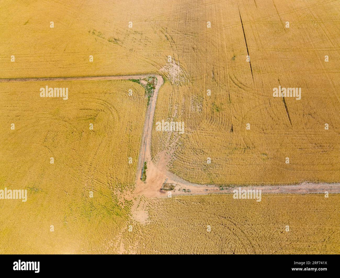 Aerial view of a squared fence line and gateway in a farmers field at ...