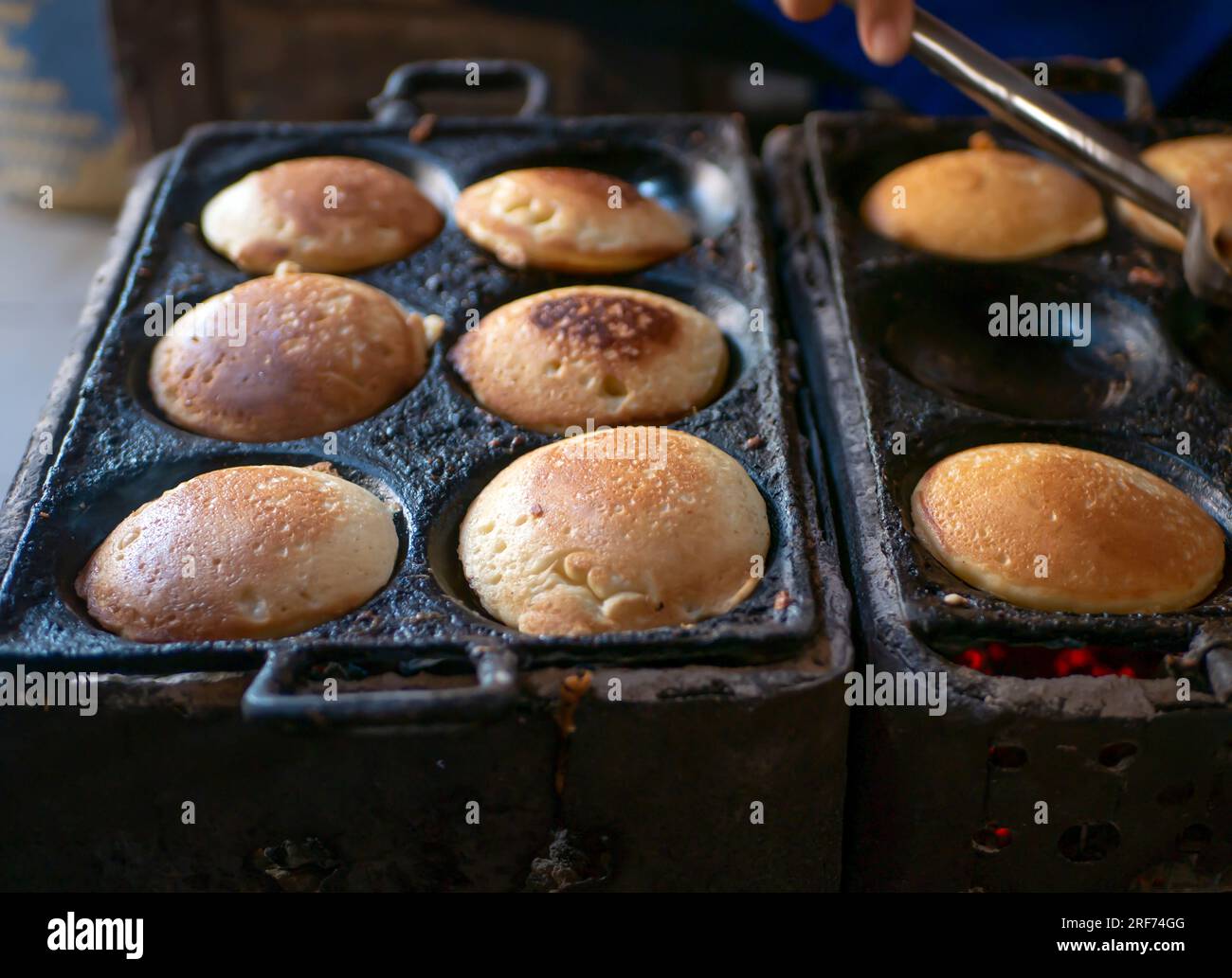 The process of cooking Kue Apem, an Indonesian traditional cake on ...
