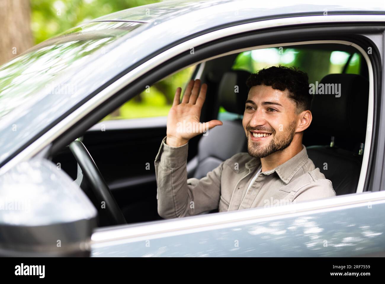 Man car waves hi-res stock photography and images - Alamy
