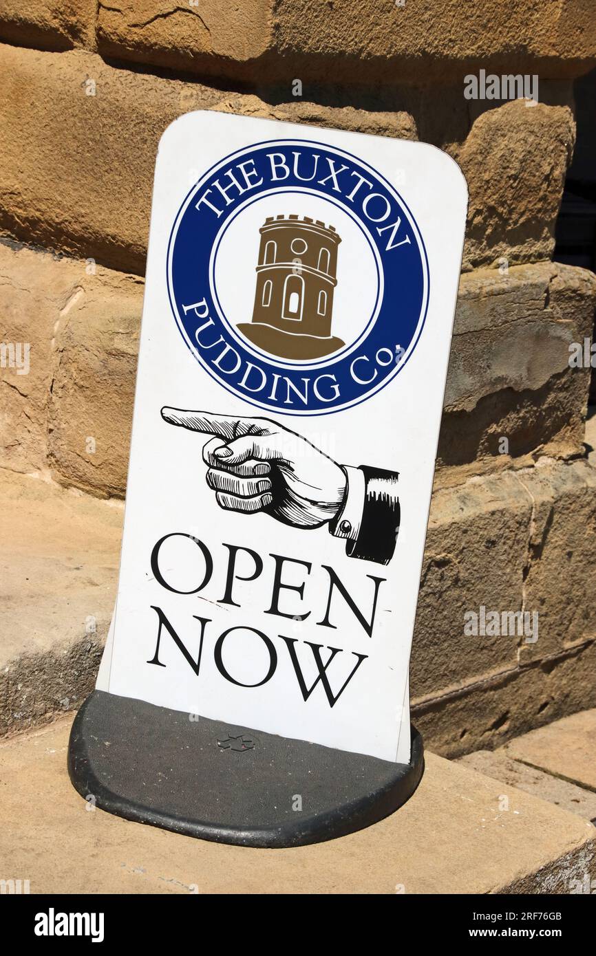 Open Now sign fot The Buxton Pudding Co Shop, Buxton Stock Photo - Alamy