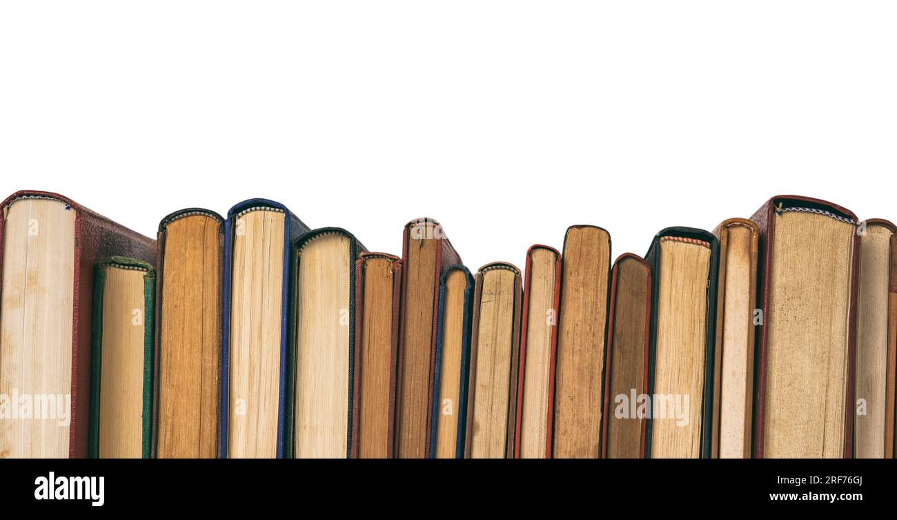 Books standing in a row isolated on white background Stock Photo - Alamy