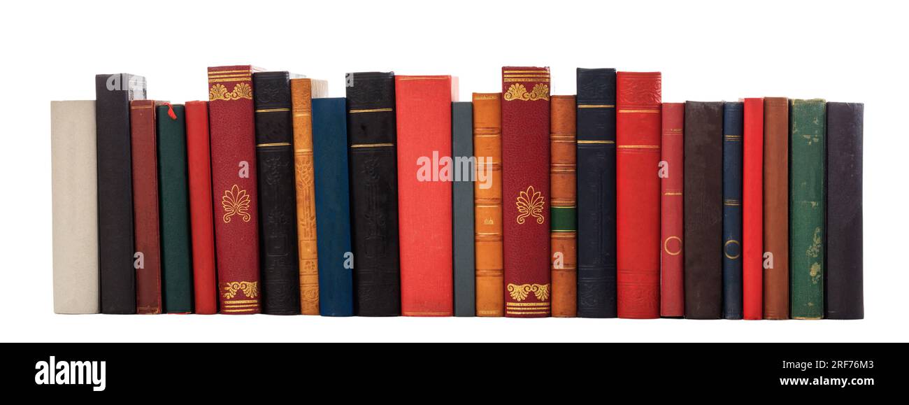 Books standing in a row isolated on white background Stock Photo - Alamy