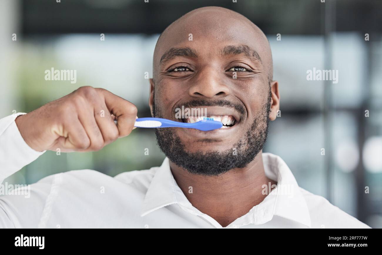 Black Man Brushing Teeth