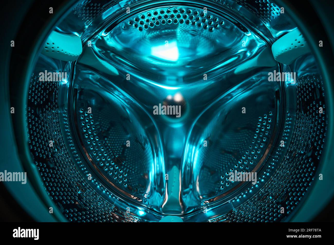 Inside washer in a blue light, future, sci-fi, concept Stock Photo - Alamy
