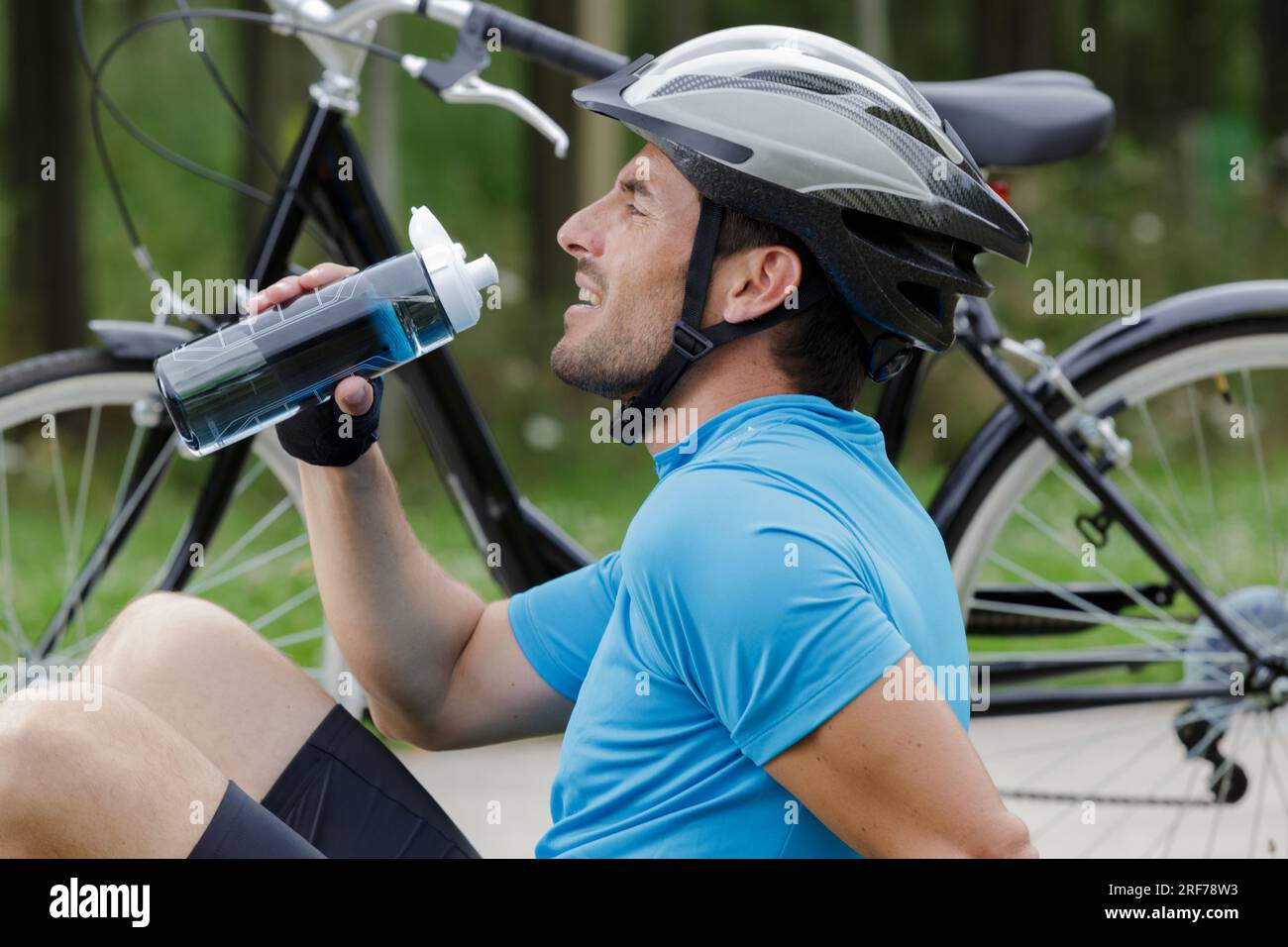 Very tired cyclist hi-res stock photography and images - Alamy