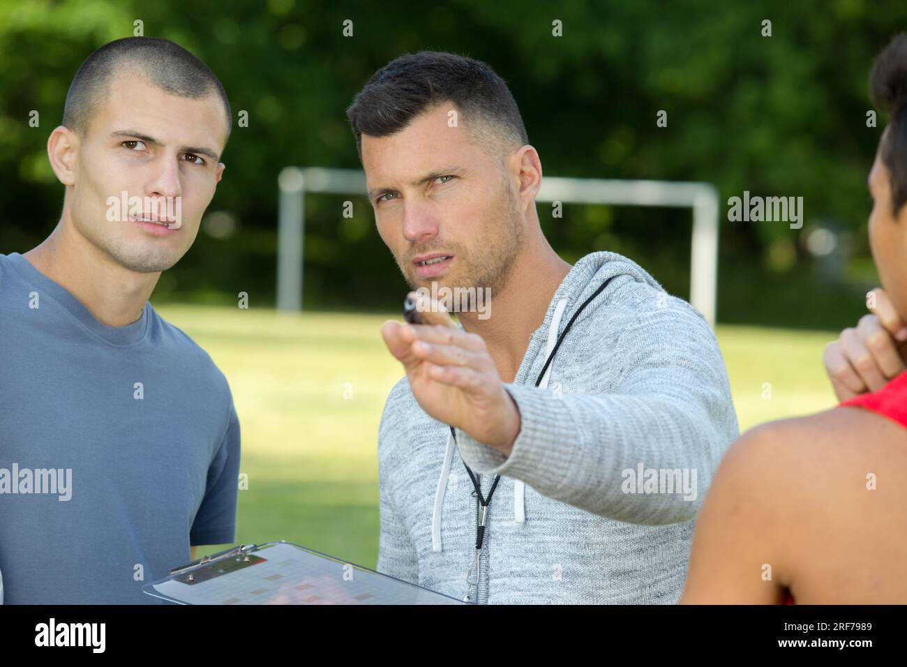 Two men talking football hi-res stock photography and images - Alamy