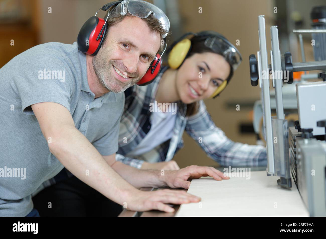 Worker wearing ear muffs hi-res stock photography and images - Alamy