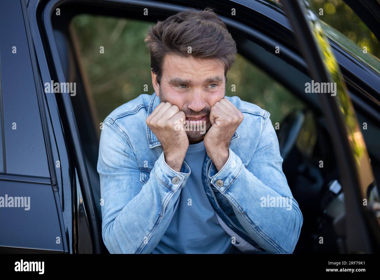 Sad man in trouble car hi-res stock photography and images - Alamy