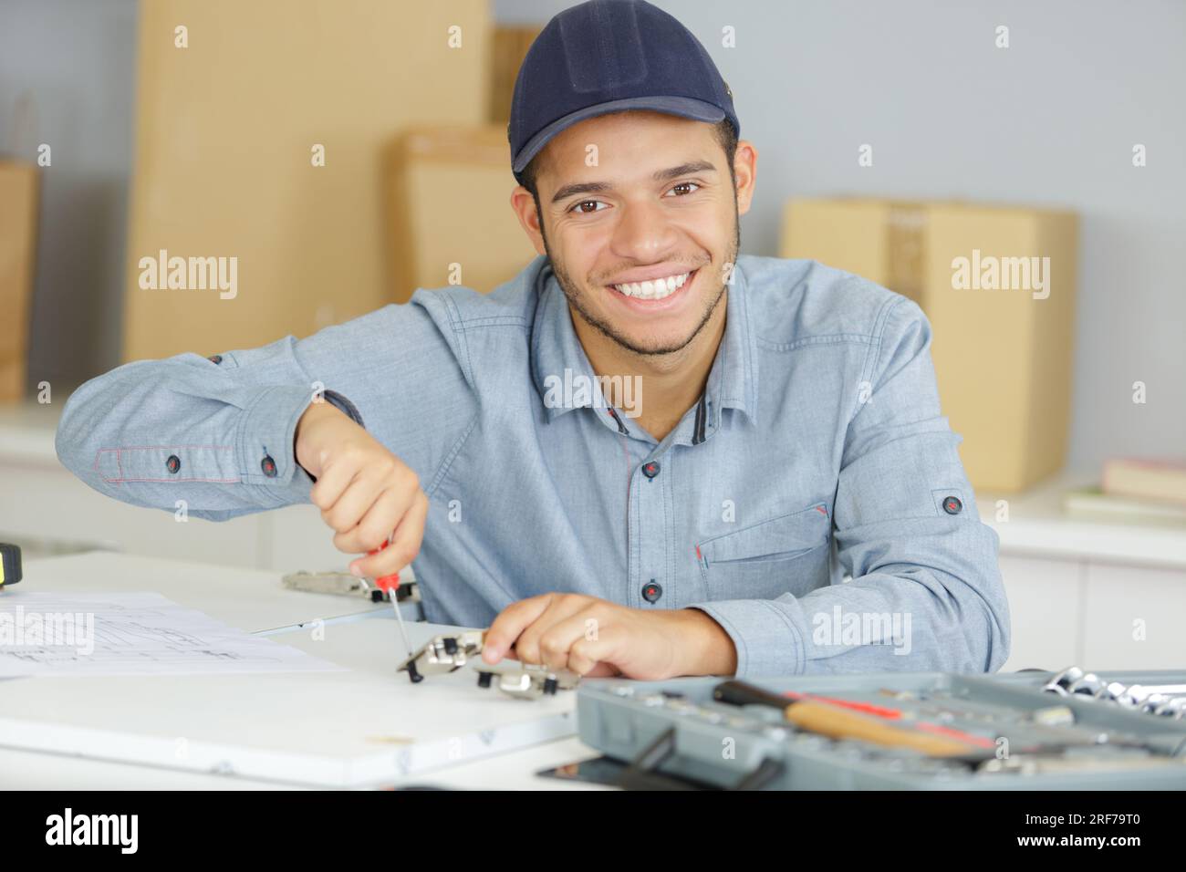 Happy man works electronic hi-res stock photography and images - Alamy