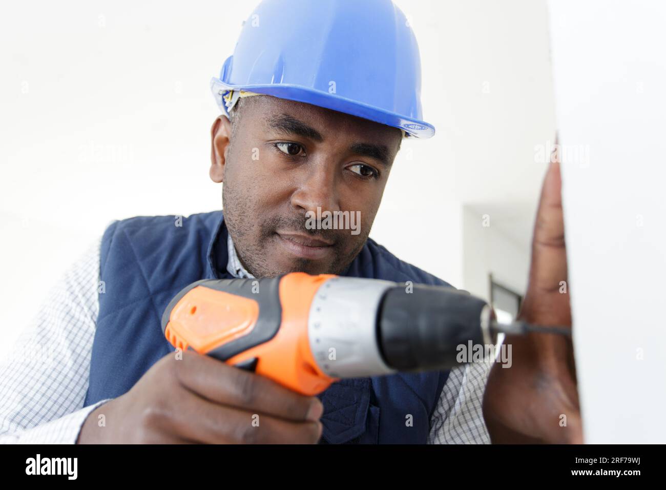 Cheerful male builder using hi-res stock photography and images - Alamy