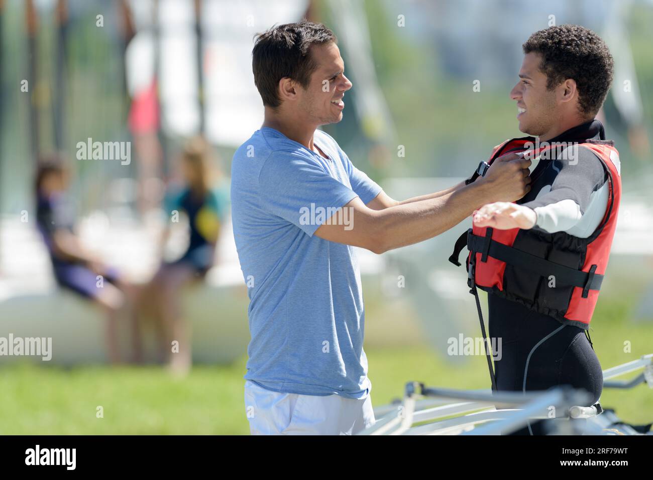 Man in wetsuit sailing hi-res stock photography and images - Alamy