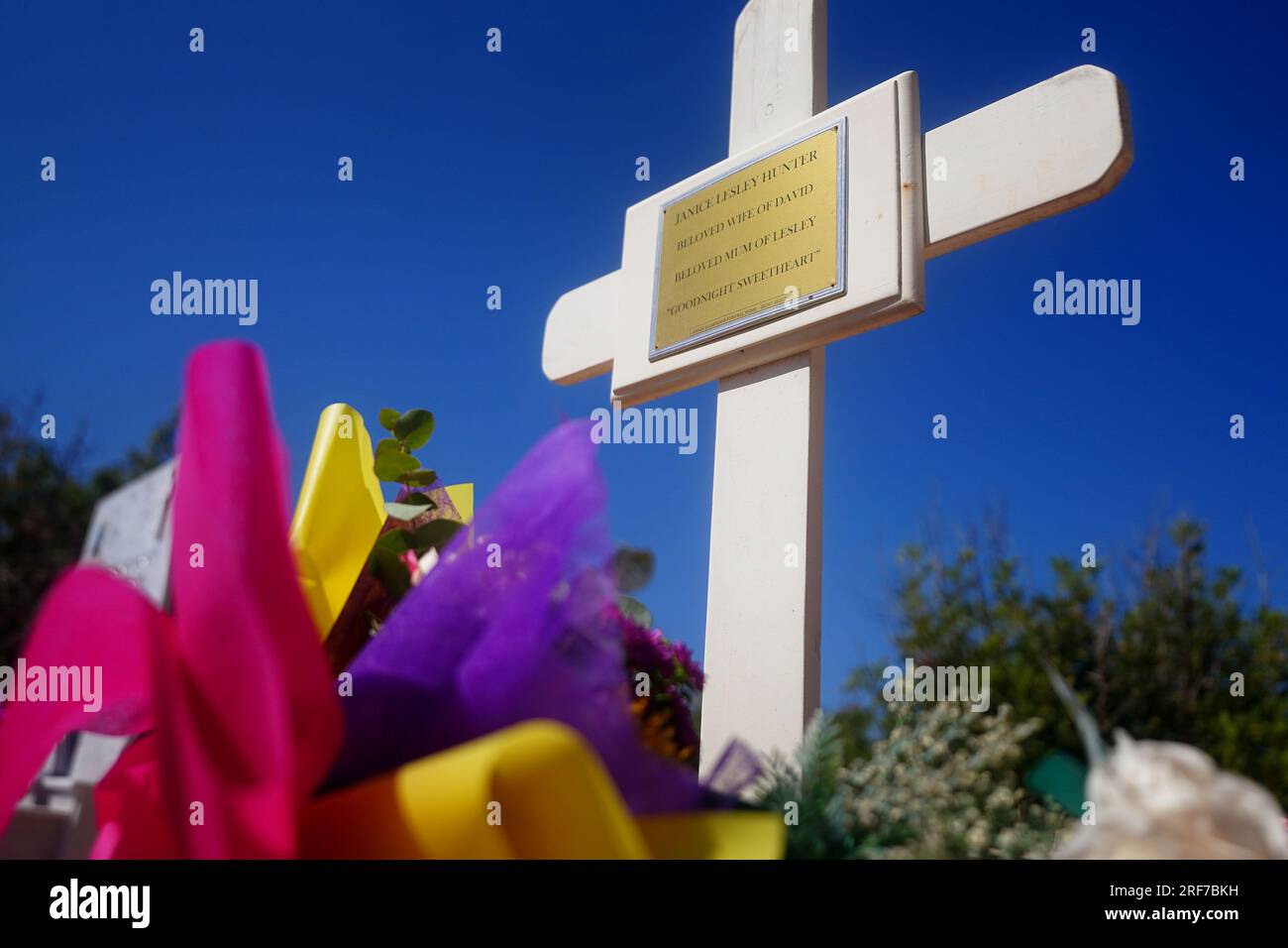 Flowers at the grave of Janice Hunter, wife of David Hunter in a ...