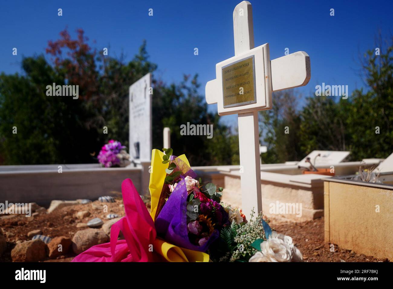 Flowers at the grave of Janice Hunter, wife of David Hunter in a ...