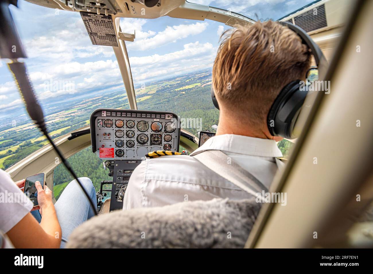 View through the front cockpit of a helicopter with details of ...