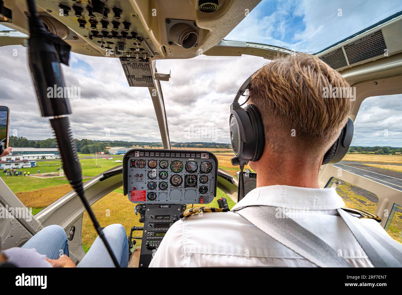 View through the front cockpit of a helicopter with details of ...