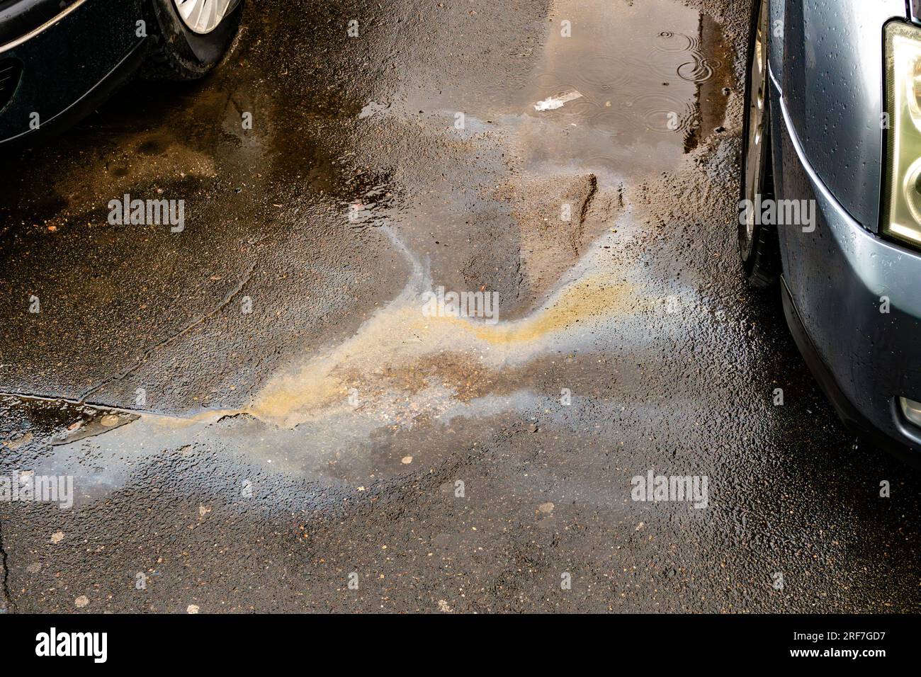 Oil slick in parking lot hi-res stock photography and images - Alamy