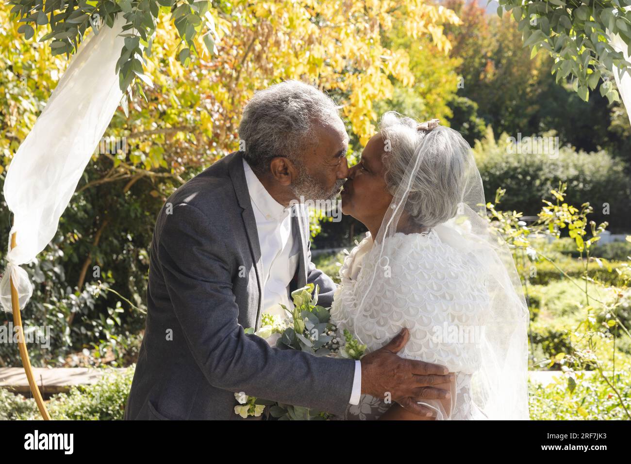 Bride And Groom Kissing At Ceremony