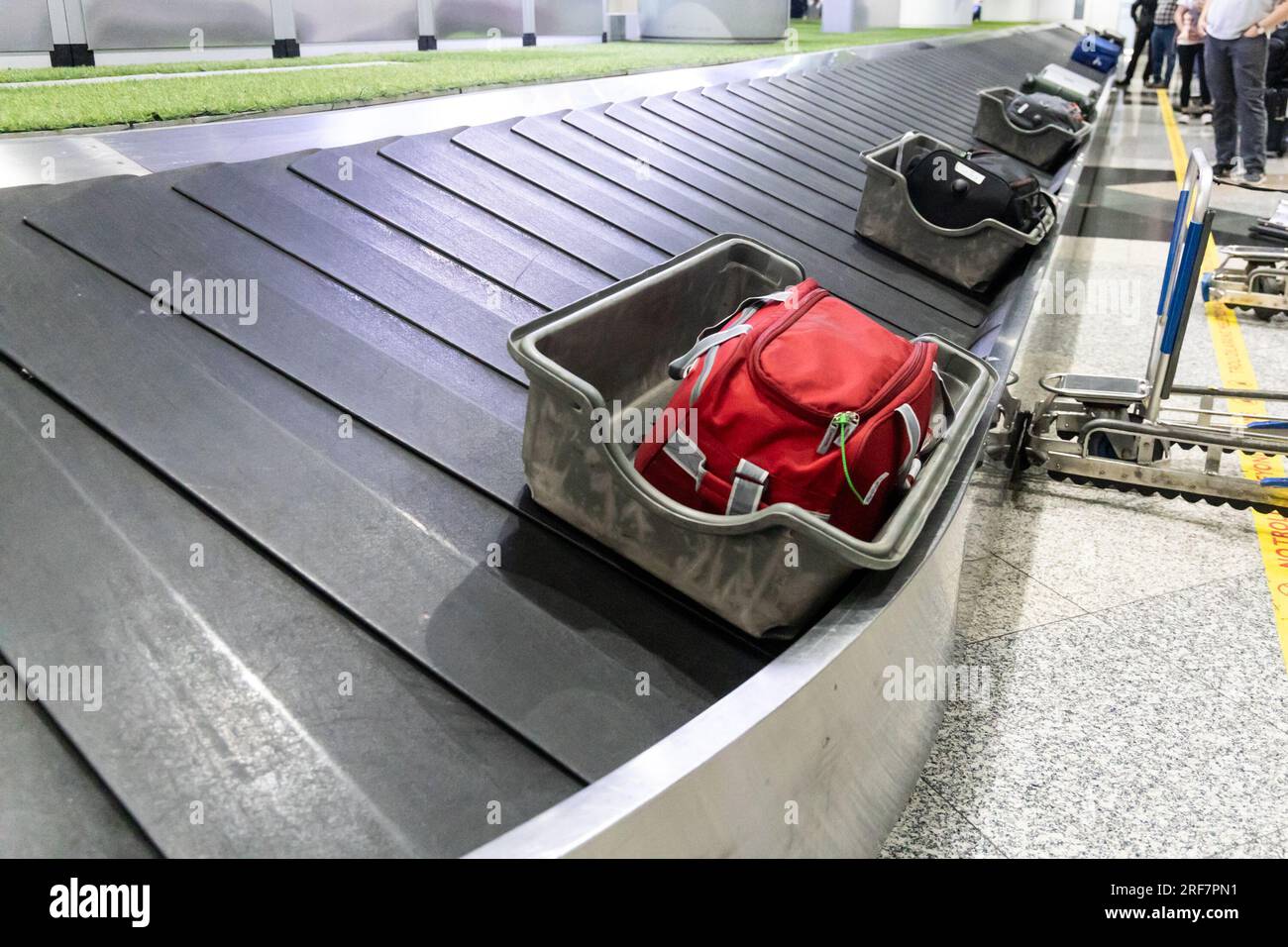 Soft and fragile bags are placed into protective containers before ...
