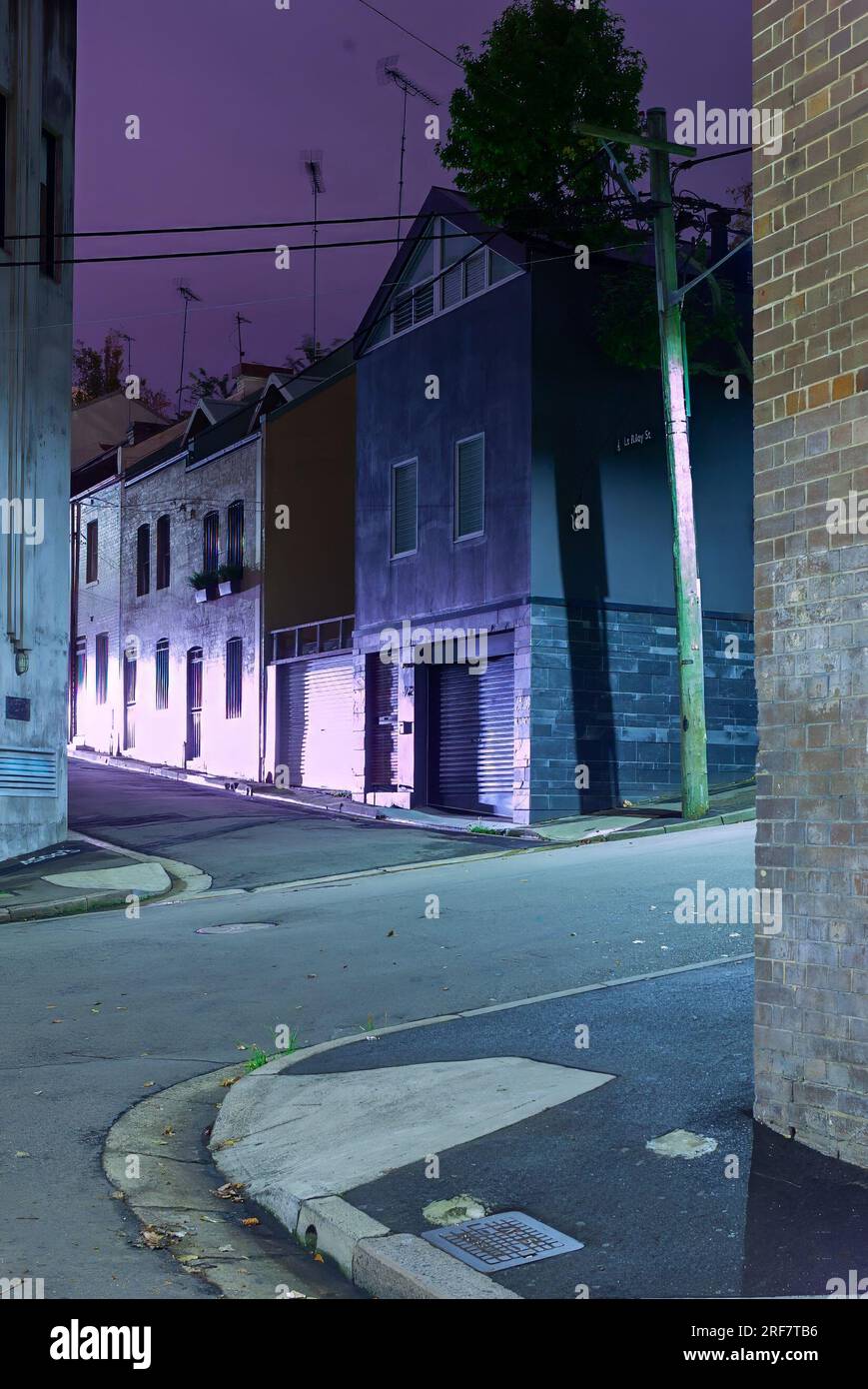 A night view of Little Riley Street in Surry Hills at its intersection ...