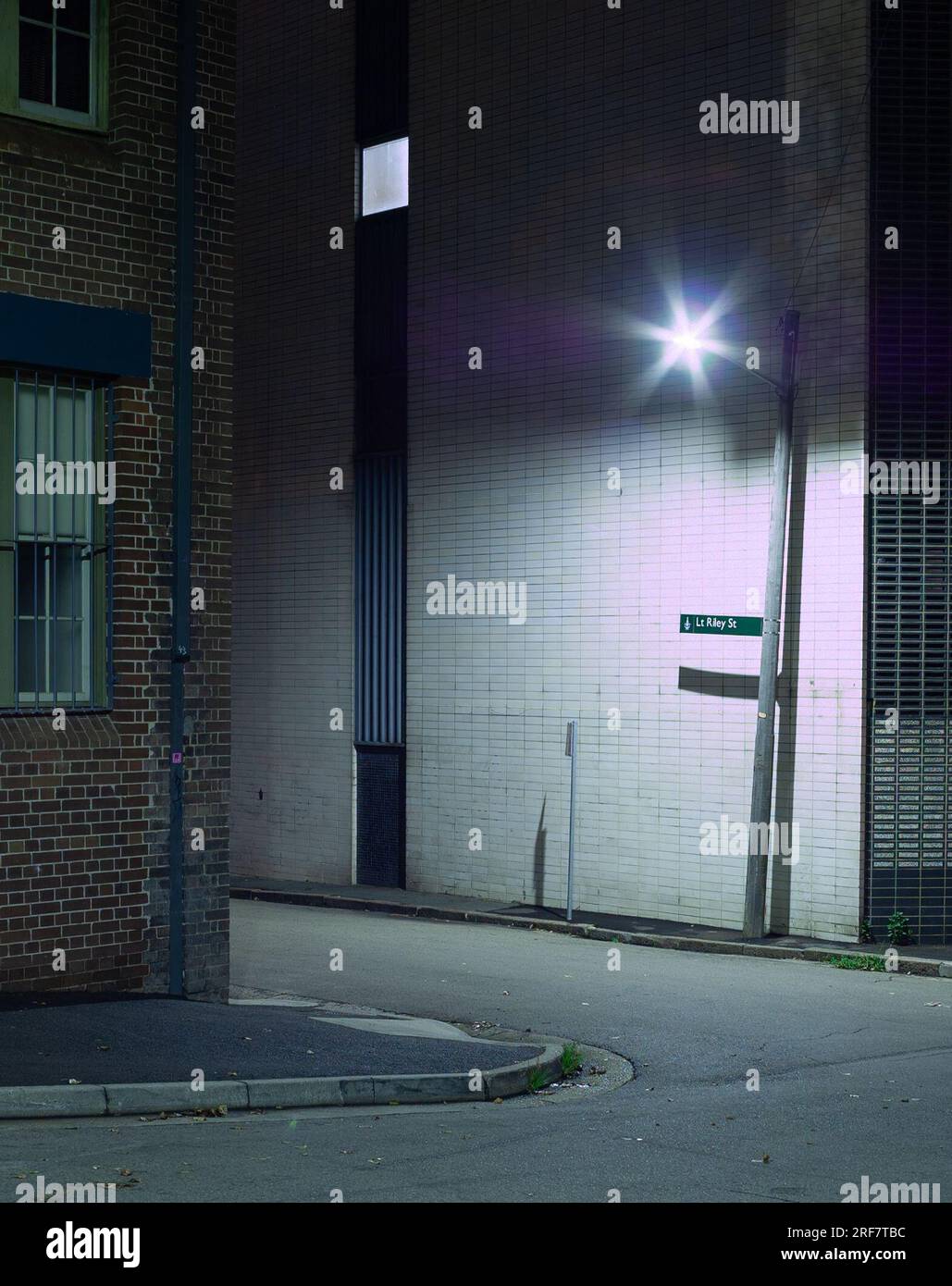 A night view of Little Riley Street in Surry Hills at its intersection ...