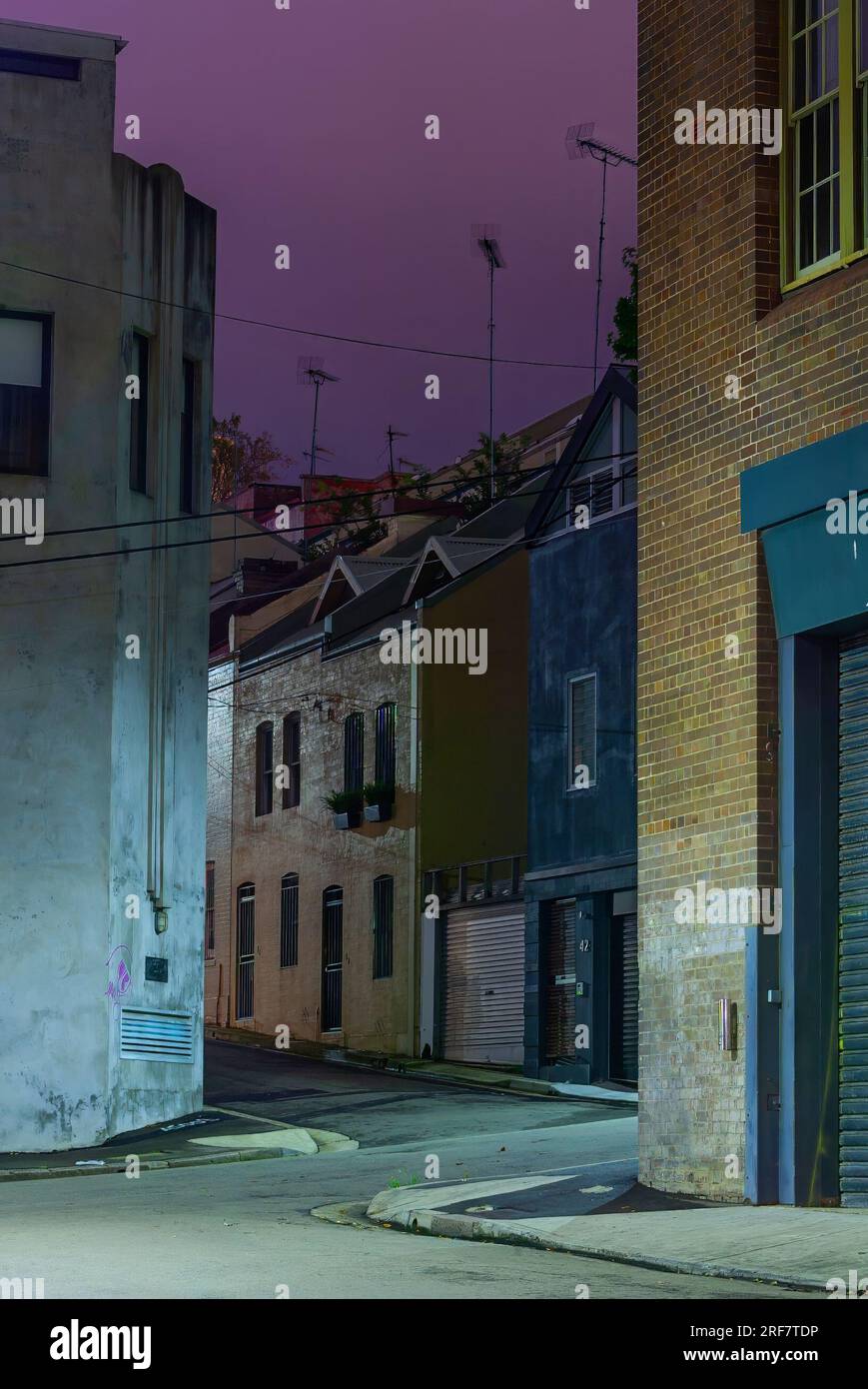 A night view of Little Riley Street in Surry Hills at its intersection ...