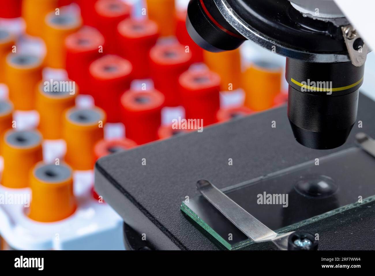 Microscope with blood samples test tubes close up Stock Photo - Alamy