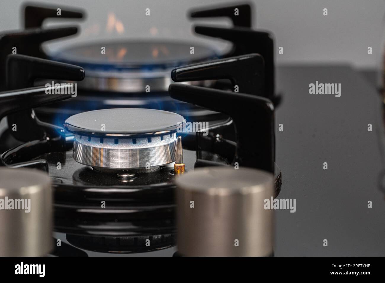 Burning gas stove burner in a kitchen Stock Photo - Alamy