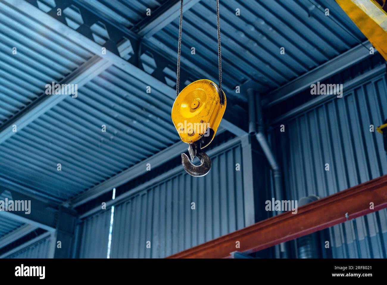 Industrial crane hook in a modern factory building Stock Photo - Alamy