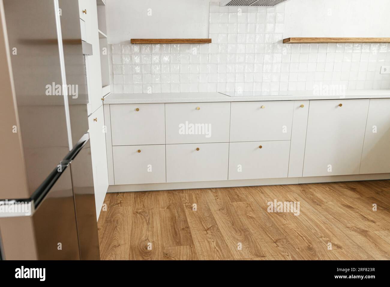 Modern minimal kitchen design. Stylish white kitchen cabinets with ...