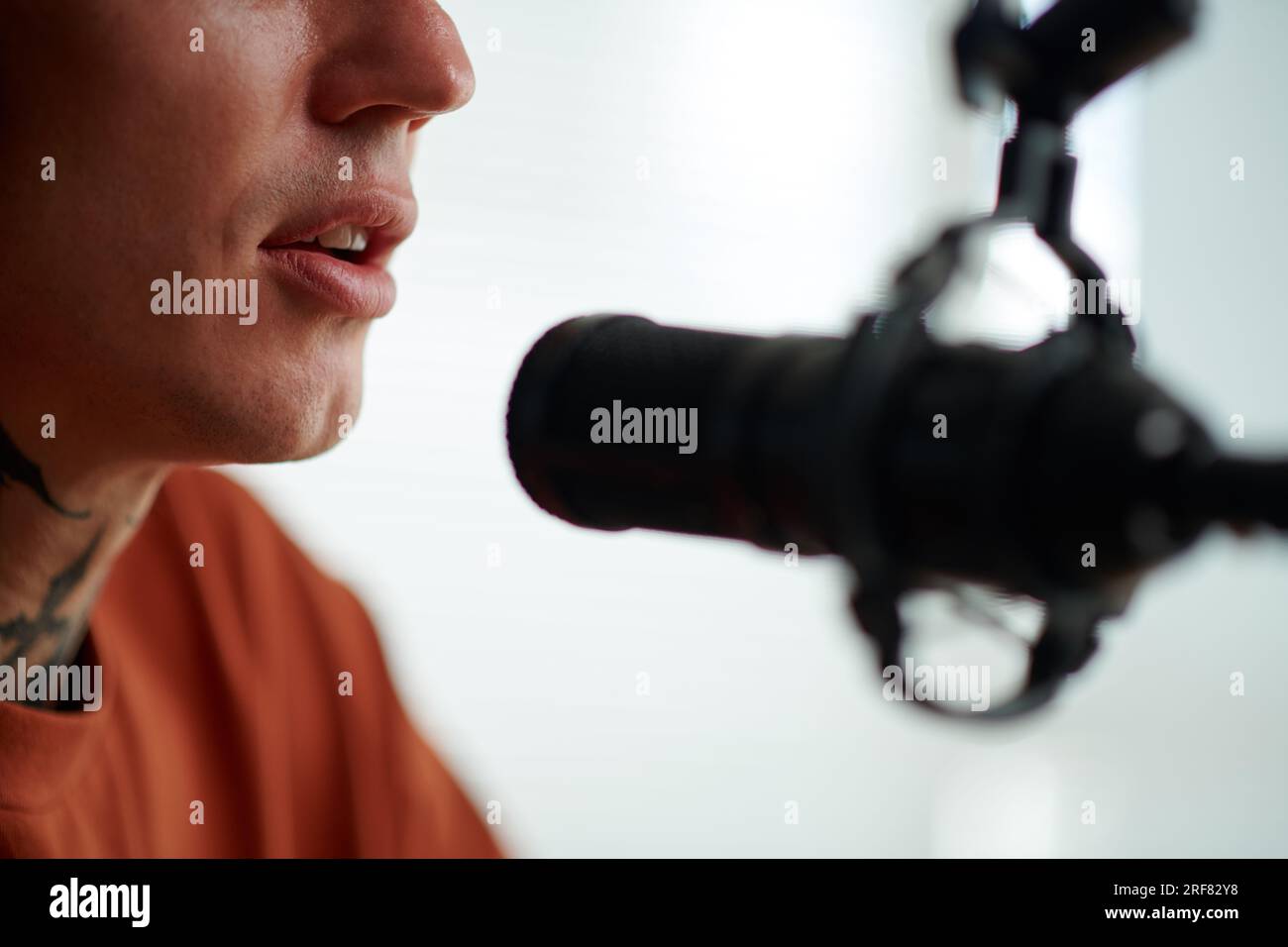 Radio host speaking into microphone hi-res stock photography and images ...
