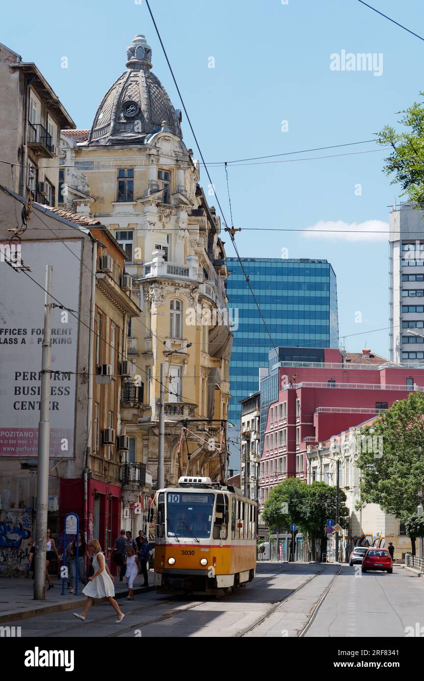 Yellow Tram aka Streetcar aka Trolley on a street in the City of Sofia ...